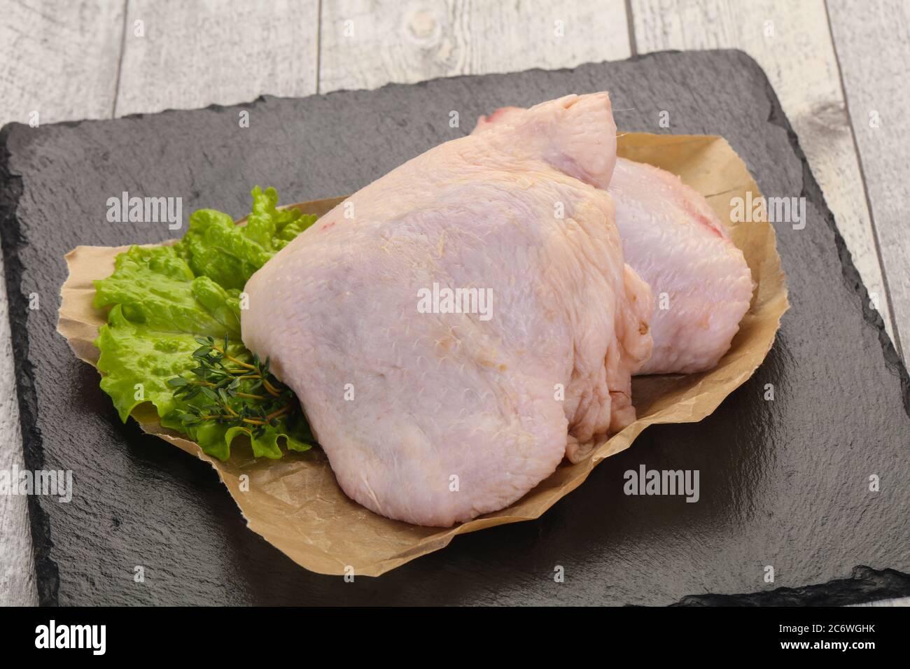 Raw chicken hip ready for cooking Stock Photo - Alamy