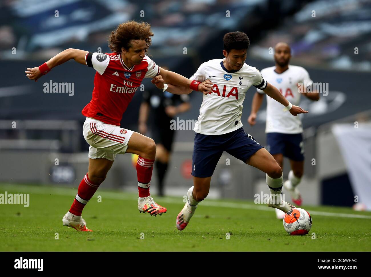 Arsenal's David Luiz (left) and Tottenham Hotspur's Son Heung-min (right) during the Premier ...
