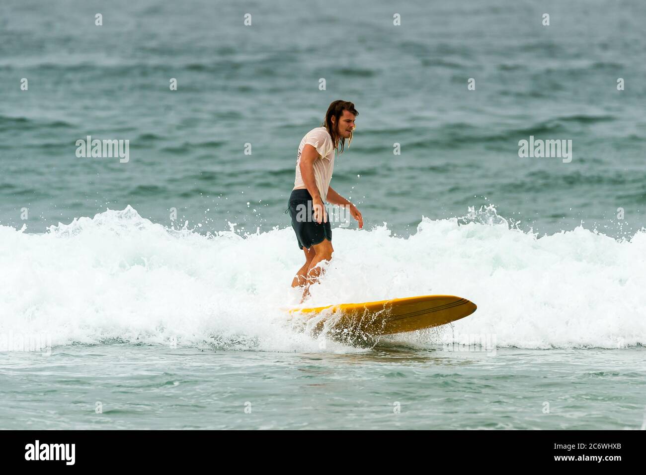 Man surfing at Venice Beach in Los Angeles, California Stock Photo - Alamy