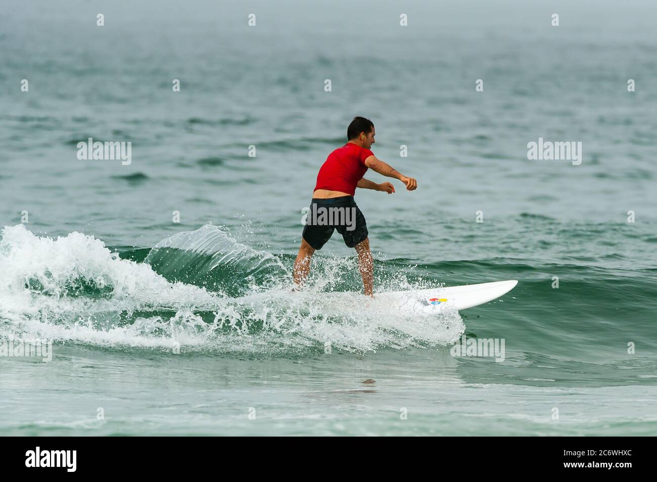 Man surfing at Venice Beach in Los Angeles, California Stock Photo - Alamy