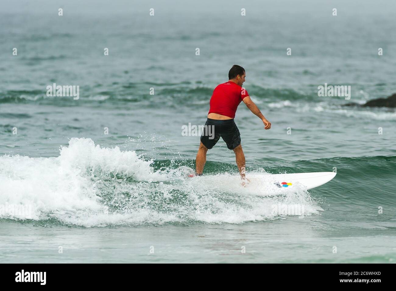Man surfing at Venice Beach in Los Angeles, California Stock Photo - Alamy
