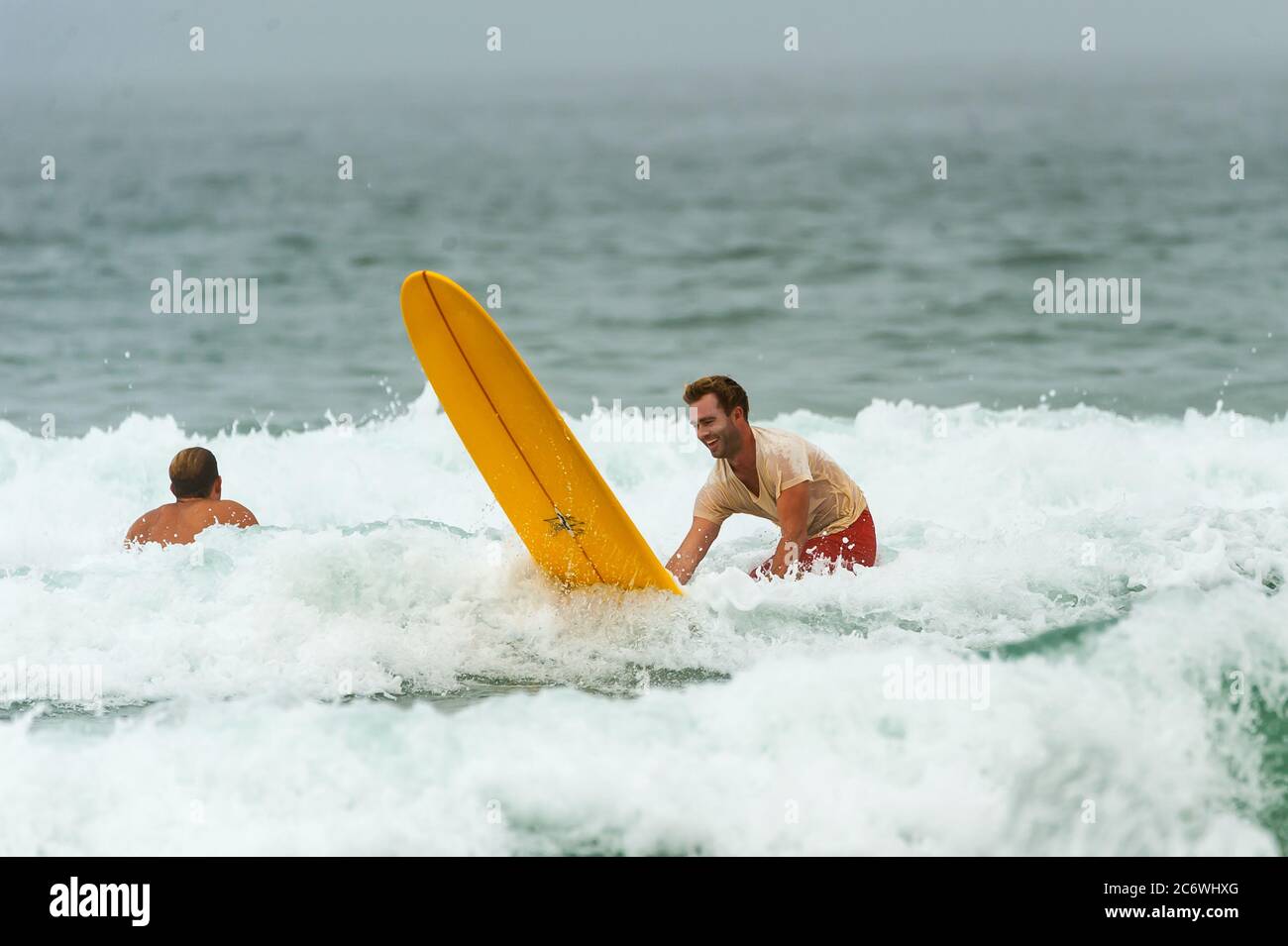 Man surfing at Venice Beach in Los Angeles, California Stock Photo - Alamy