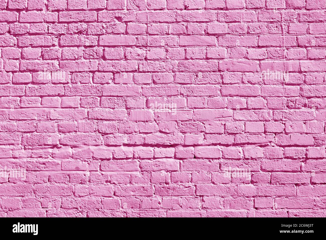 Pink brick wall. Loft interior design. Pink paint of the facade ...