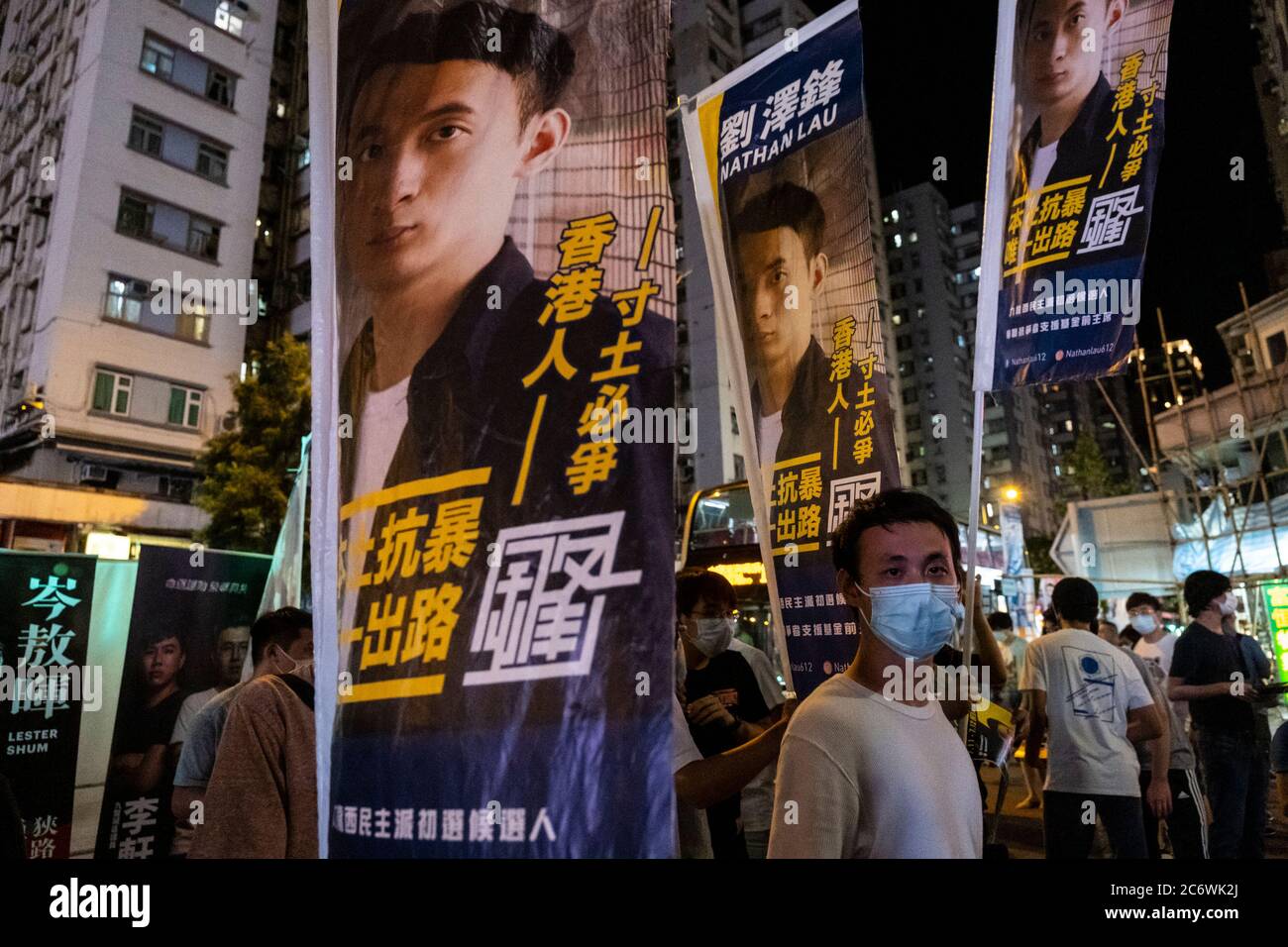 Hong Kong, China. 12th July, 2020. Nathan Lau stands outside a ...