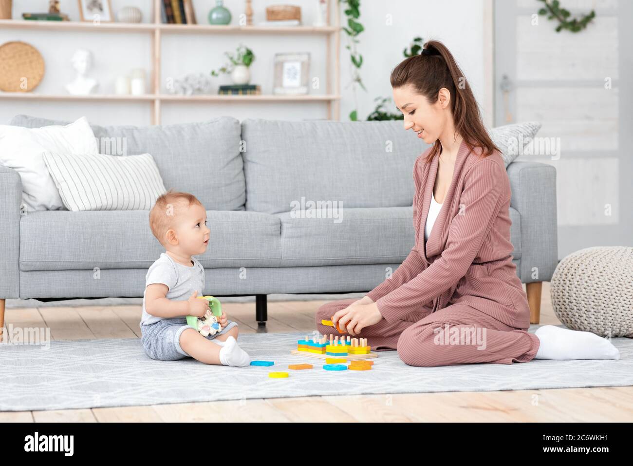 Baby Developmental Activities. Mom Playing Educational Games With Her ...