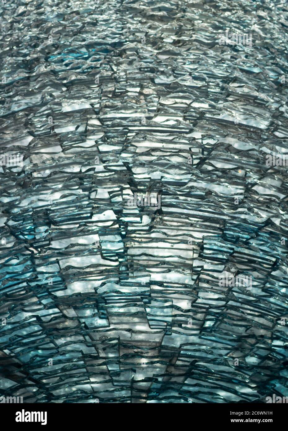 Backlit by the sun, a detail of the art installation "Reflections on ...