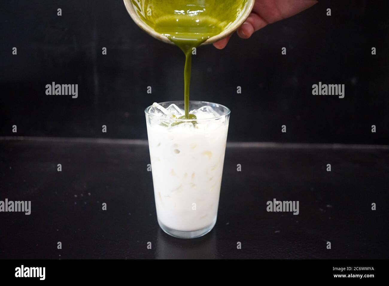 Iced green tea milk in a cafe Stock Photo - Alamy