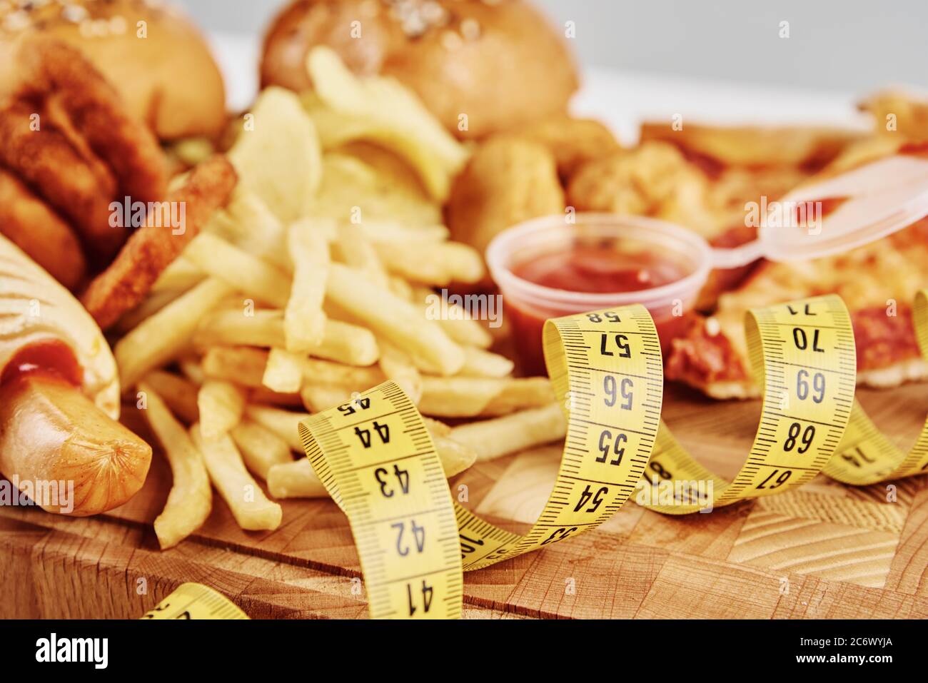 Unhealthy and junk food. Different types of fastfood and snacks on ...