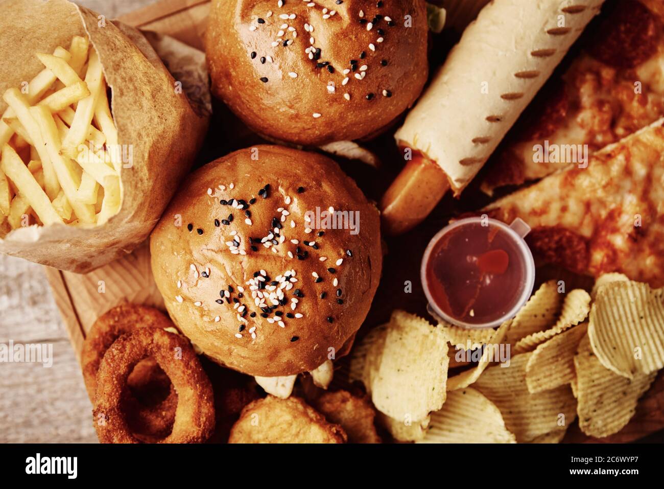 Unhealthy products and junk food. Different types of fastfood and ...