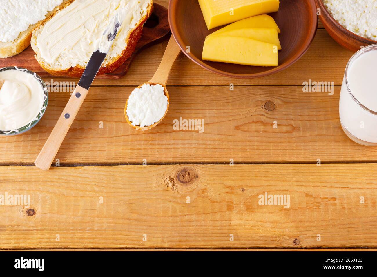 Various dairy products. Milk, cottage cheese, hard cheese and sour ...