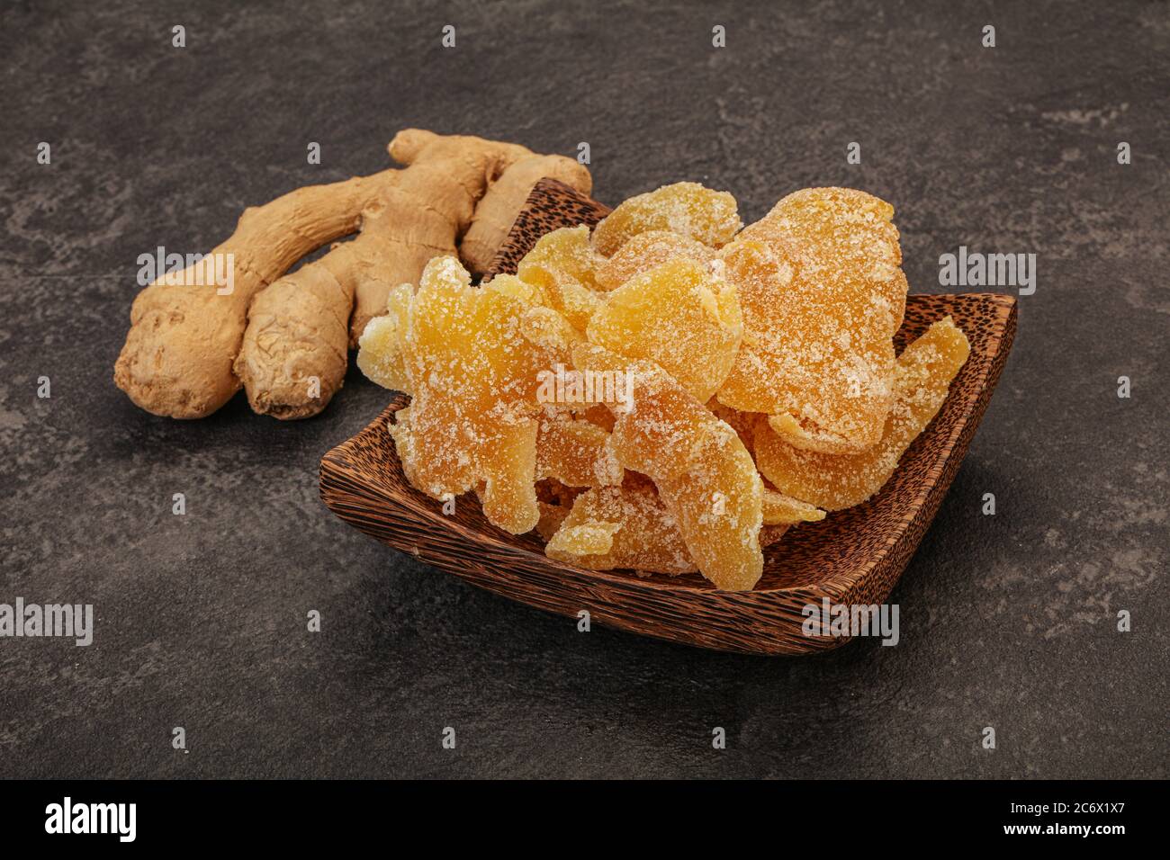 Dry sweet ginger snack in the bowl Stock Photo - Alamy