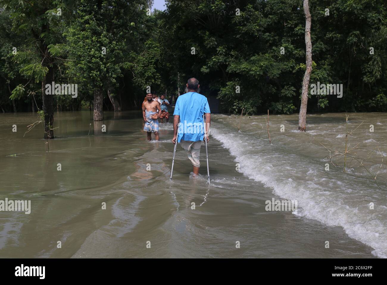 Displaced people climate change asia hi-res stock photography and ...