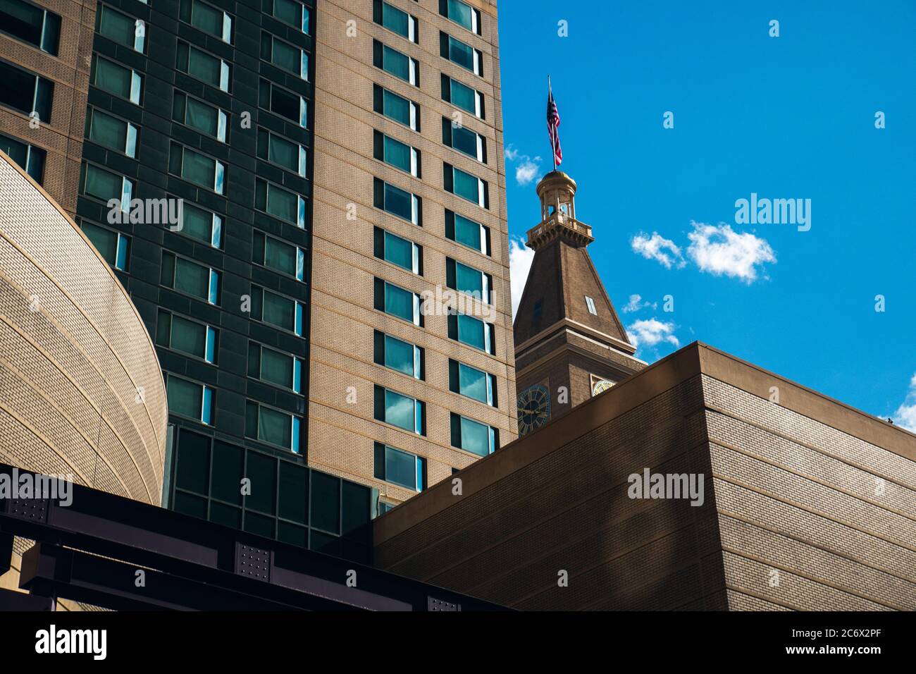 American flag on the top of the building, city of Denver Colorado USA ...