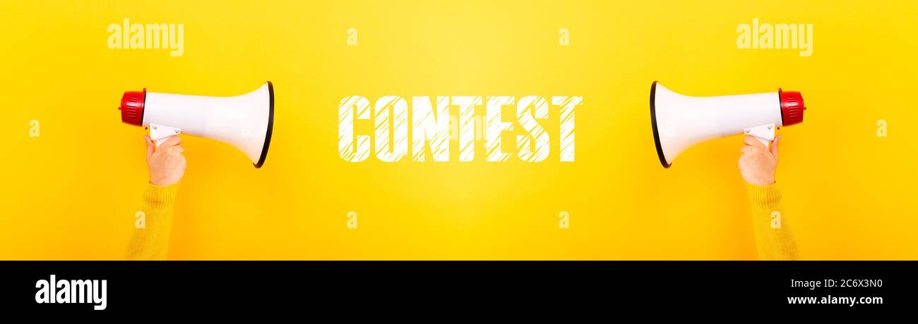 megaphones and inscription contest on yellow background, panoramic ...