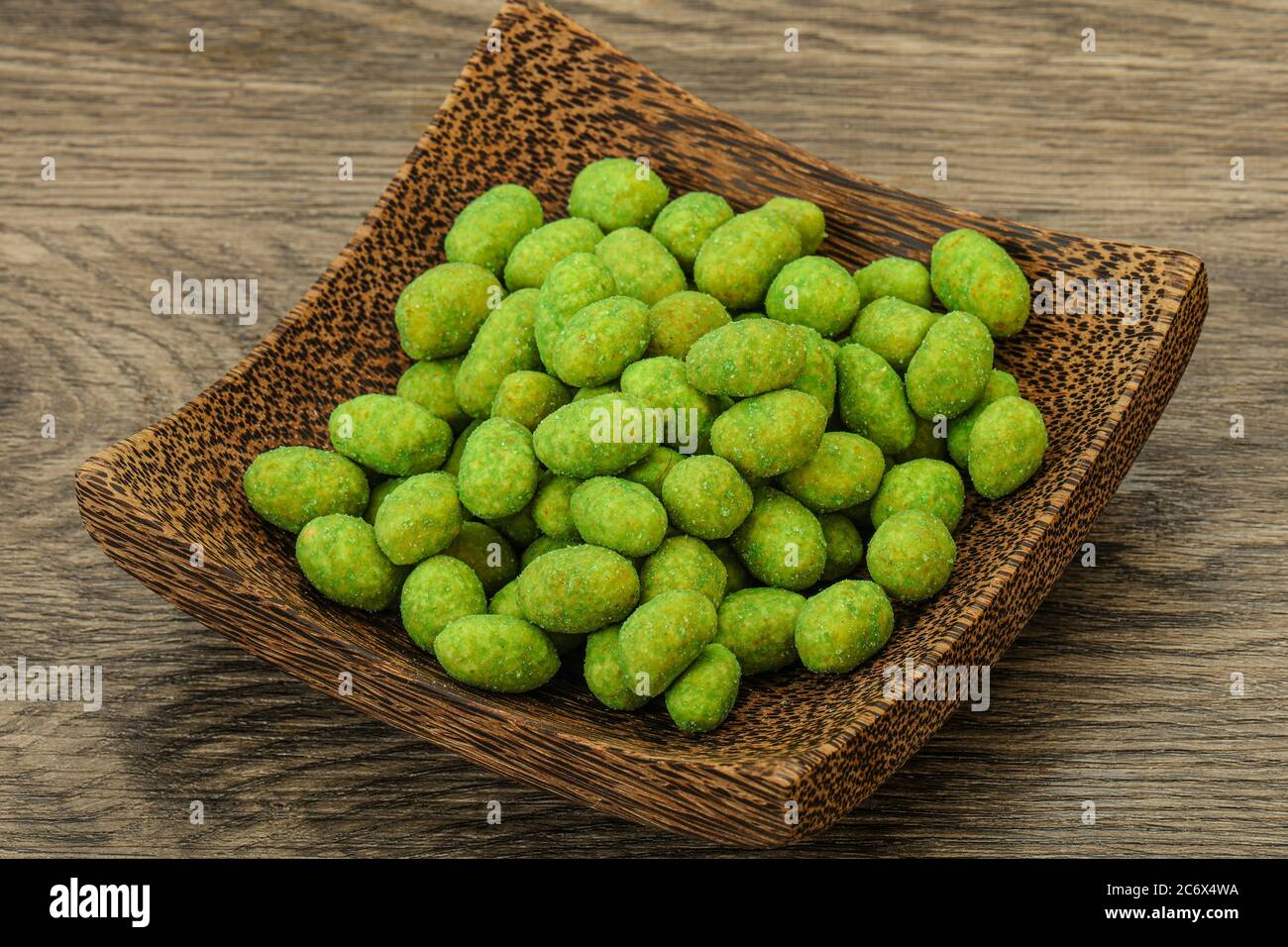 Spicy wasabi peanuts snack in the bowl Stock Photo - Alamy