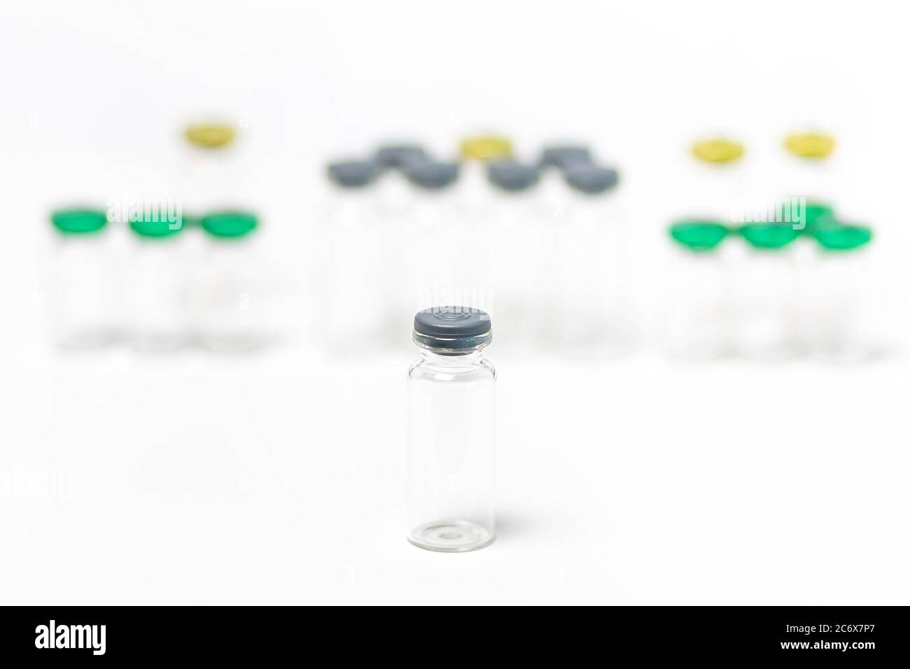 Clean and empty medical vials with caps isolated on white background ...