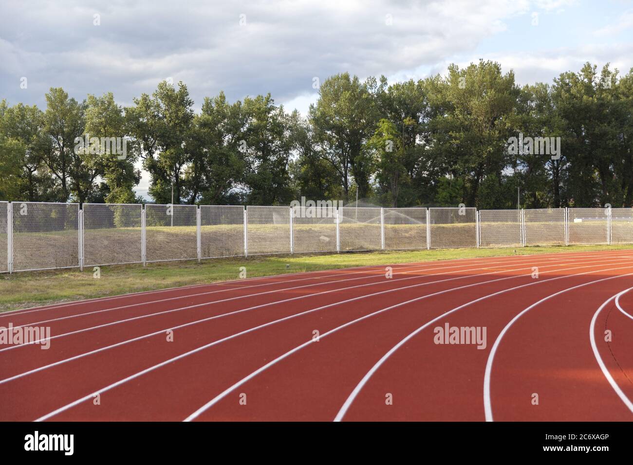 white stripes on running track Stock Photo - Alamy