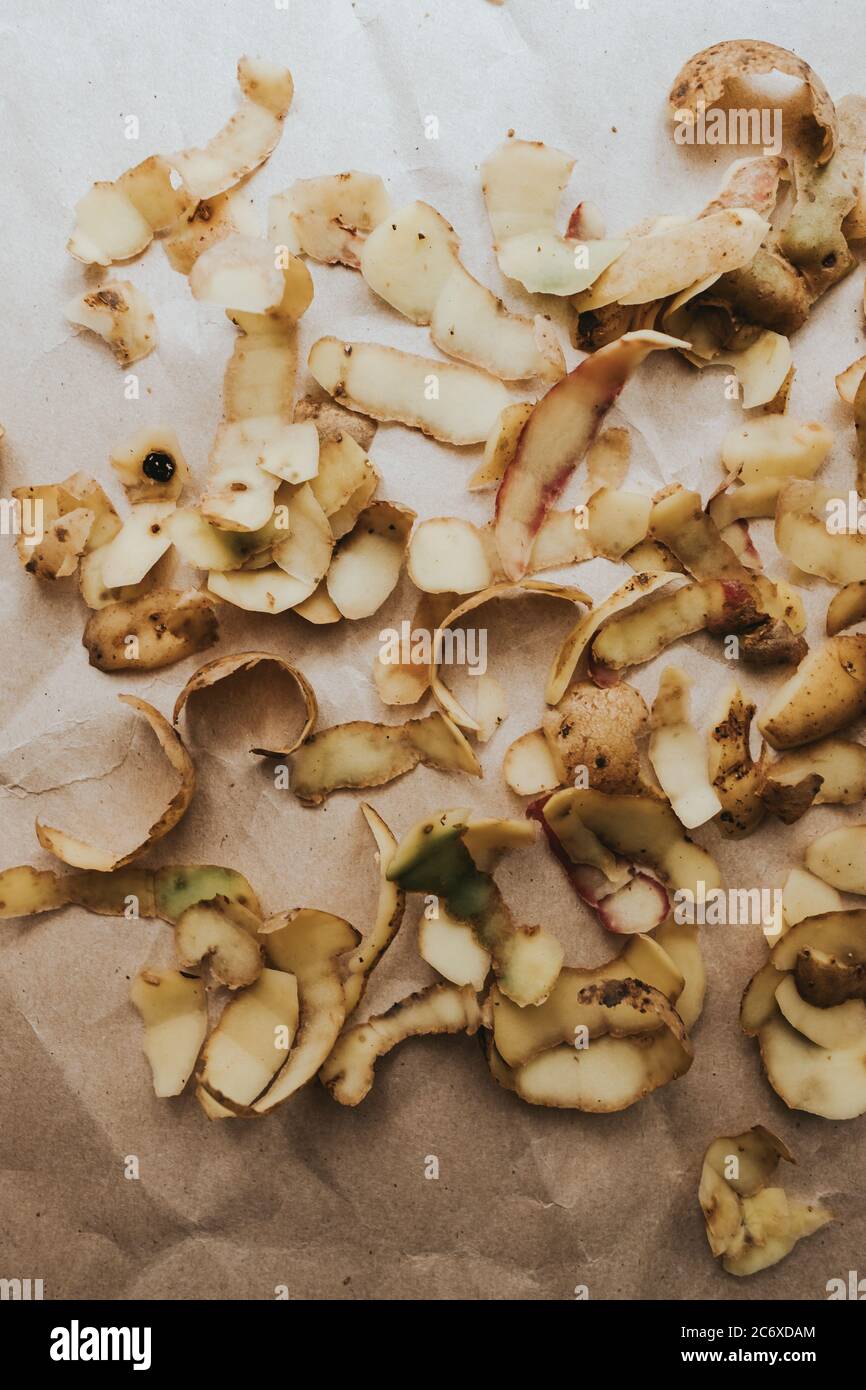Potato skins on craft paper Stock Photo - Alamy