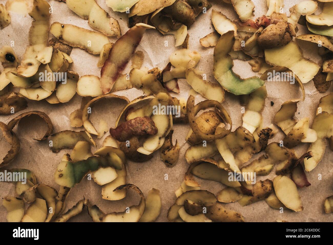 Potato skins on craft paper Stock Photo - Alamy