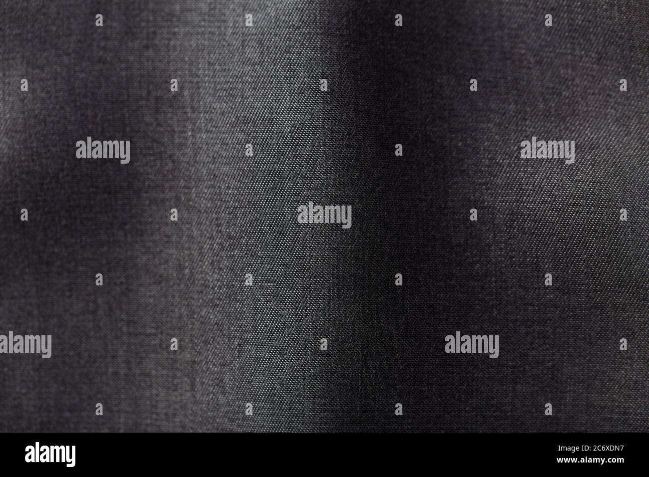 Close up of dark tencel fabric. Tencel (Lyocell) is a form of rayon ...