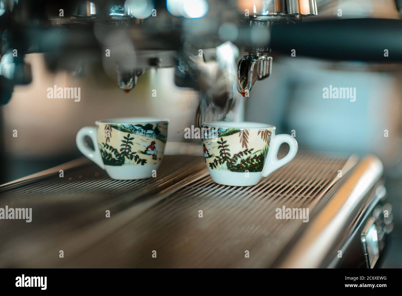 Italian espresso machine on a counter in a restaurant dispensing Stock ...