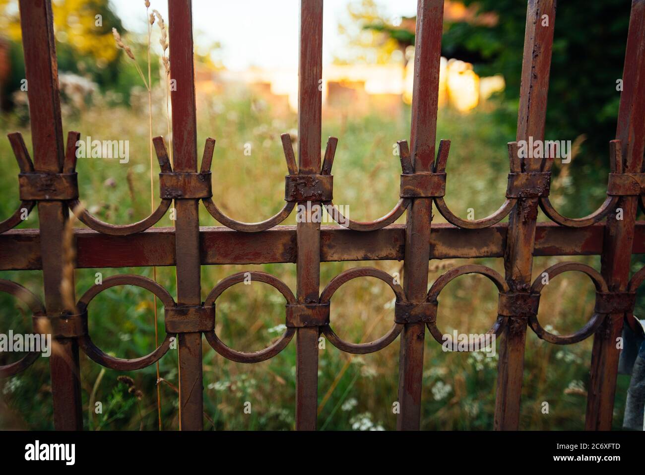Rustic vintage metal fence closeup Stock Photo - Alamy