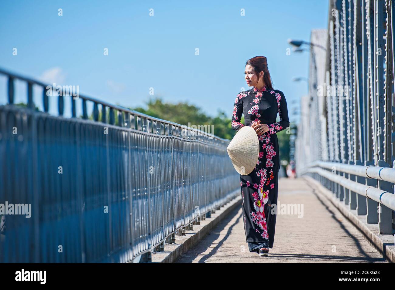 beautiful woman walking over Truong Tien Bridge in Hue / Vietnam Stock ...