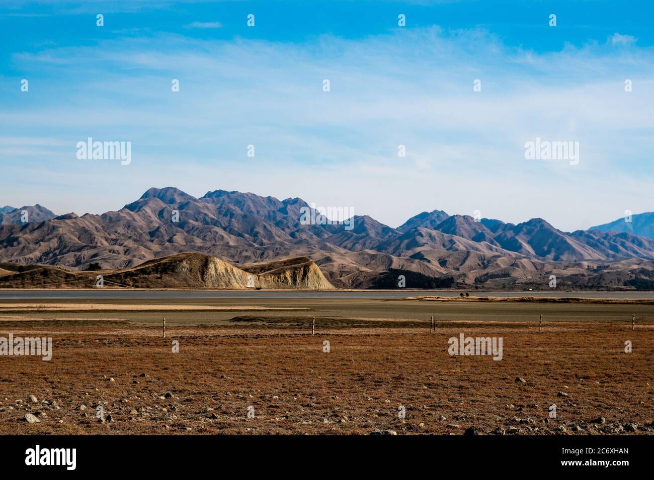 The extreme arid dry terrain around Lake Grassmere with a dramatic ...