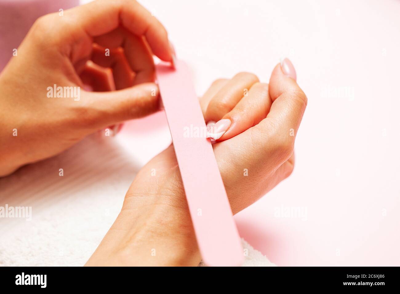 Woman close up of doing manicure on hands Stock Photo - Alamy