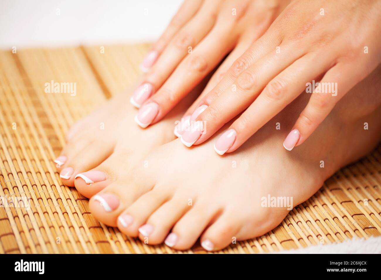 Beautiful legs of a woman with a fresh pedicure Stock Photo - Alamy