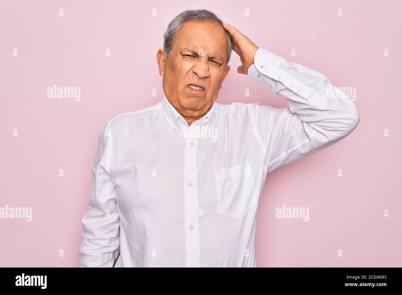 Senior handsome grey-haired man wearing elegant shirt over isolated ...