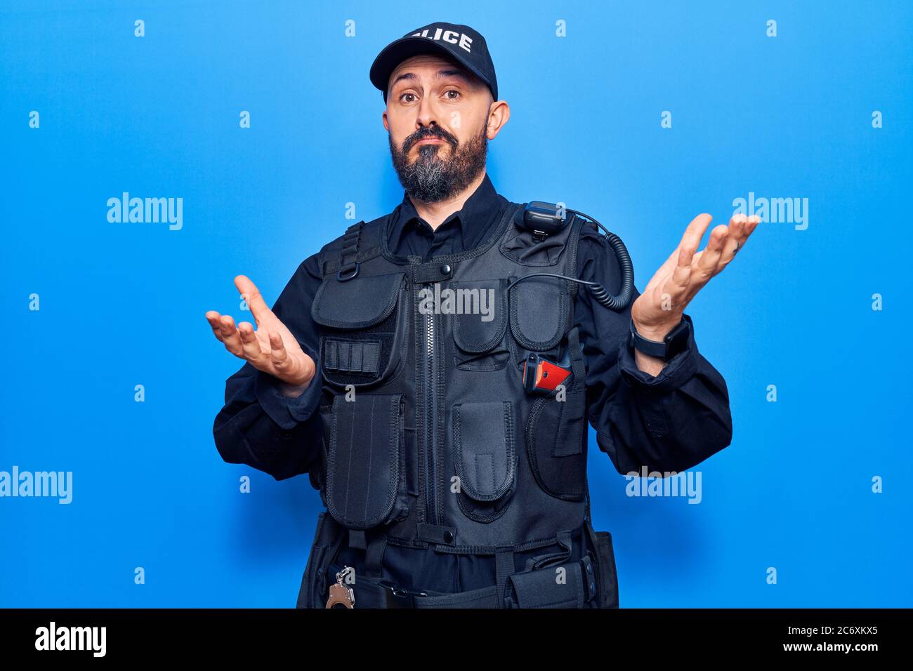Shrugging cop hi-res stock photography and images - Alamy