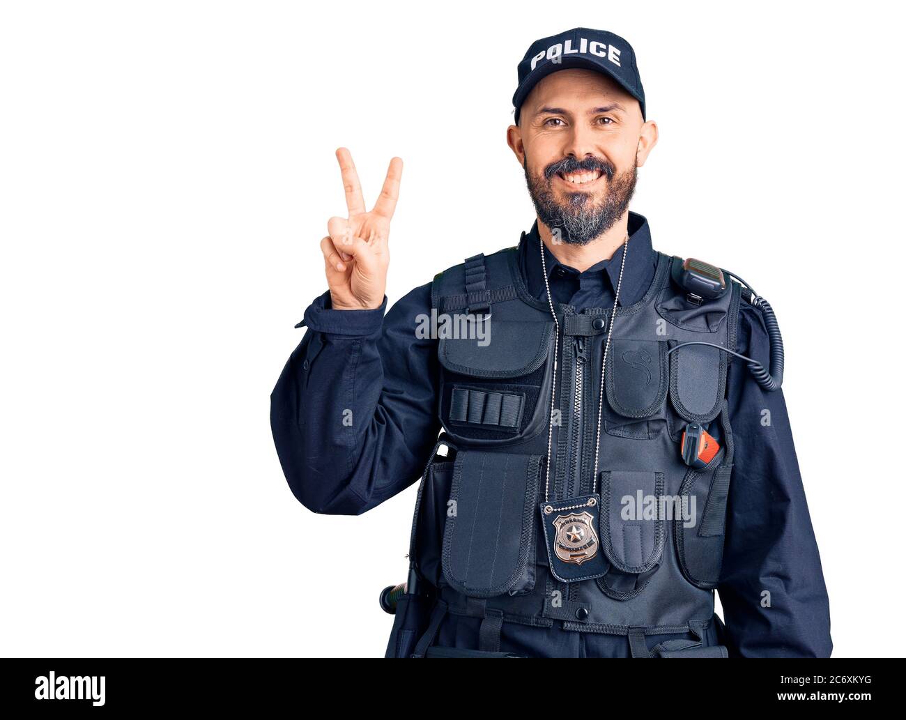 Young handsome man wearing police uniform smiling looking to the camera ...