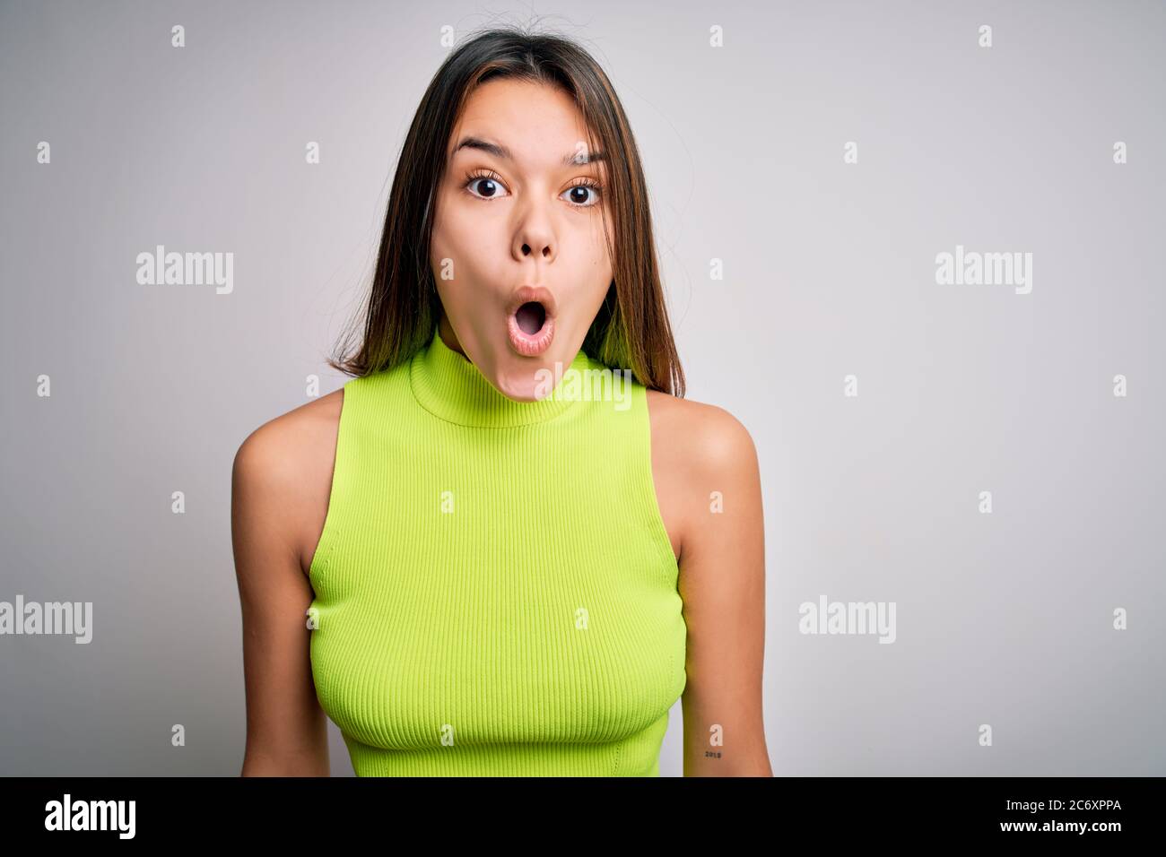 Young beautiful brunette girl wearing casual summer t-shirt over ...