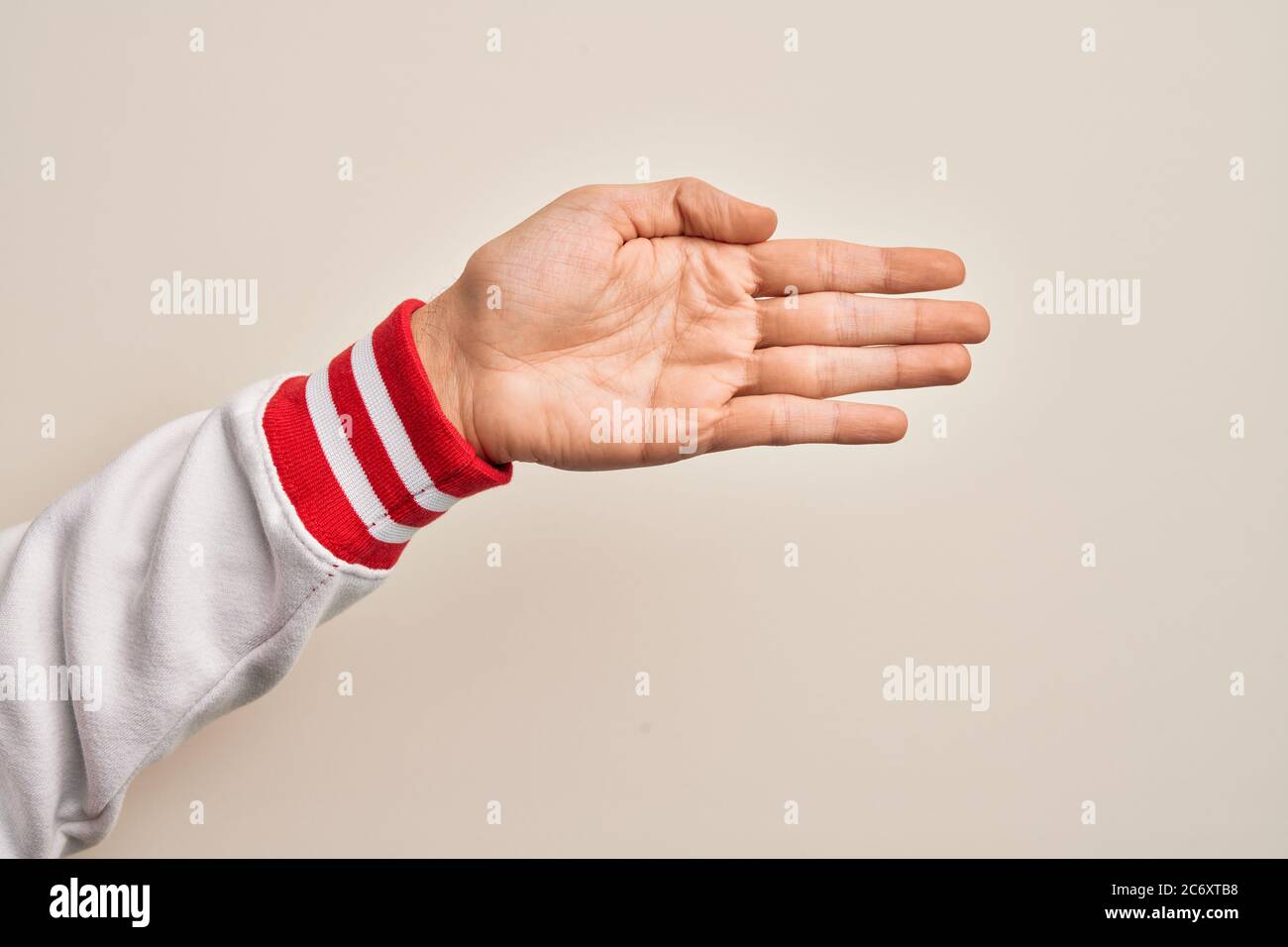 Hand of caucasian young man showing fingers over isolated white ...
