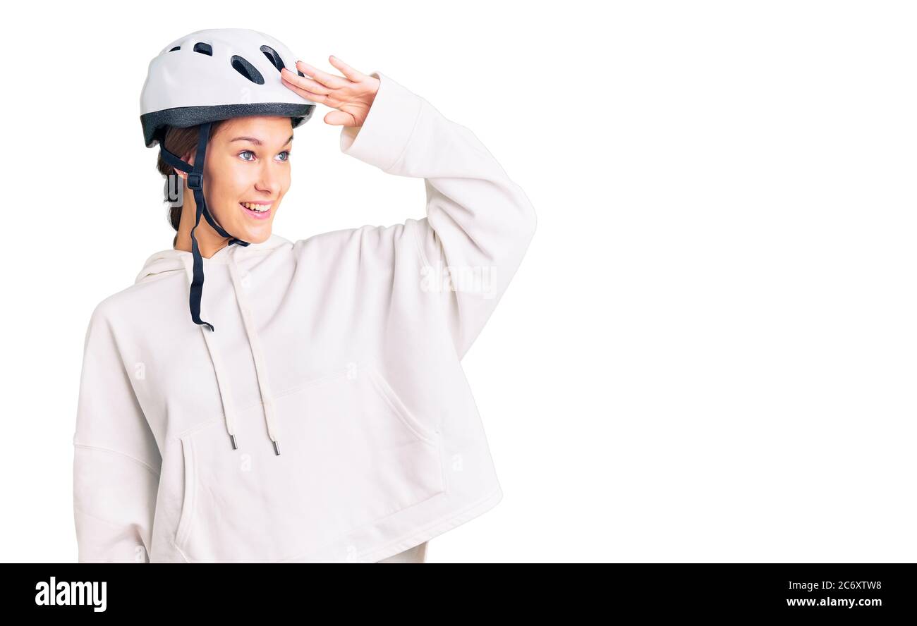 Beautiful Brunette Young Woman Wearing Bike Helmet And Sporty Clothes