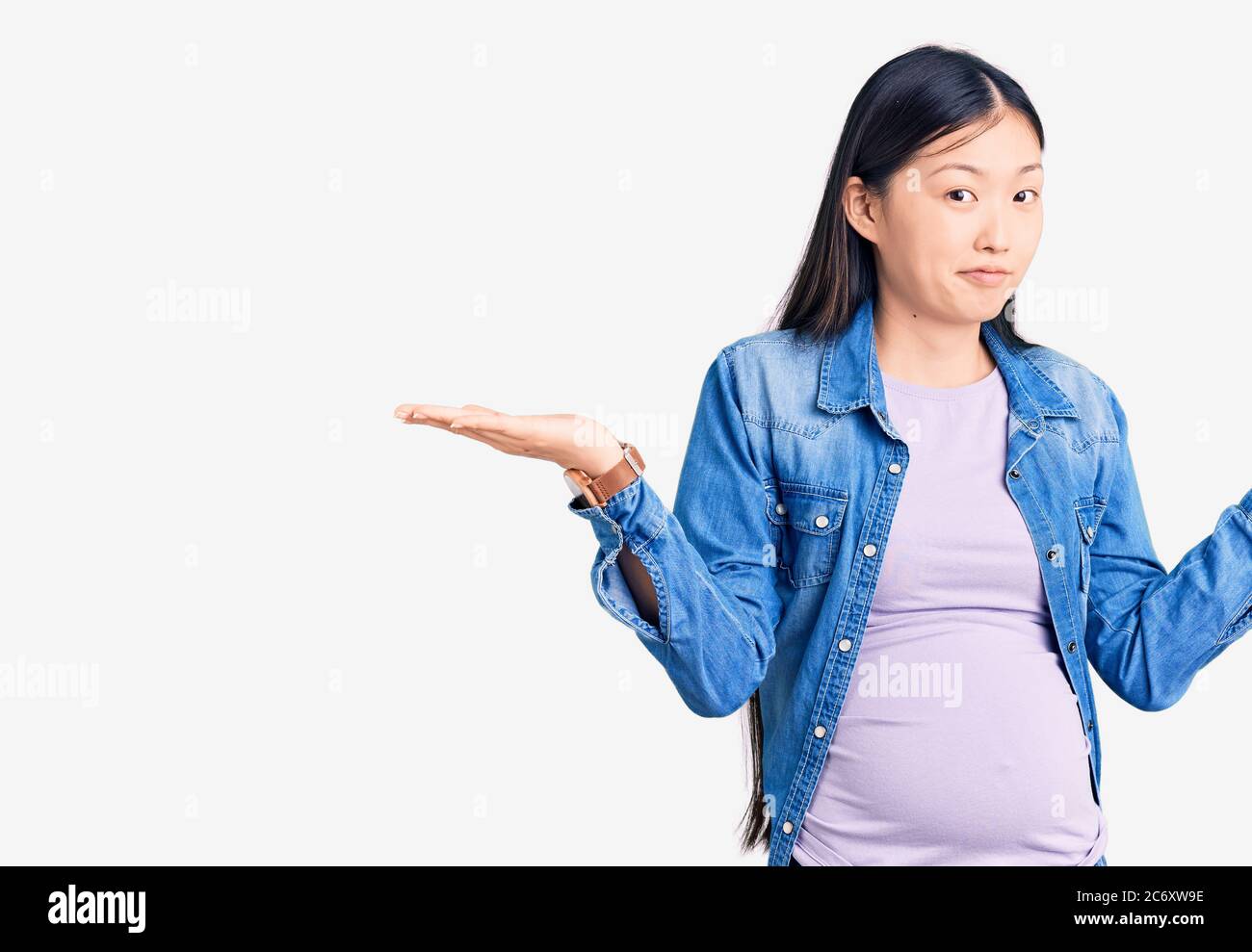 Baby with confused expression Cut Out Stock Images & Pictures - Alamy