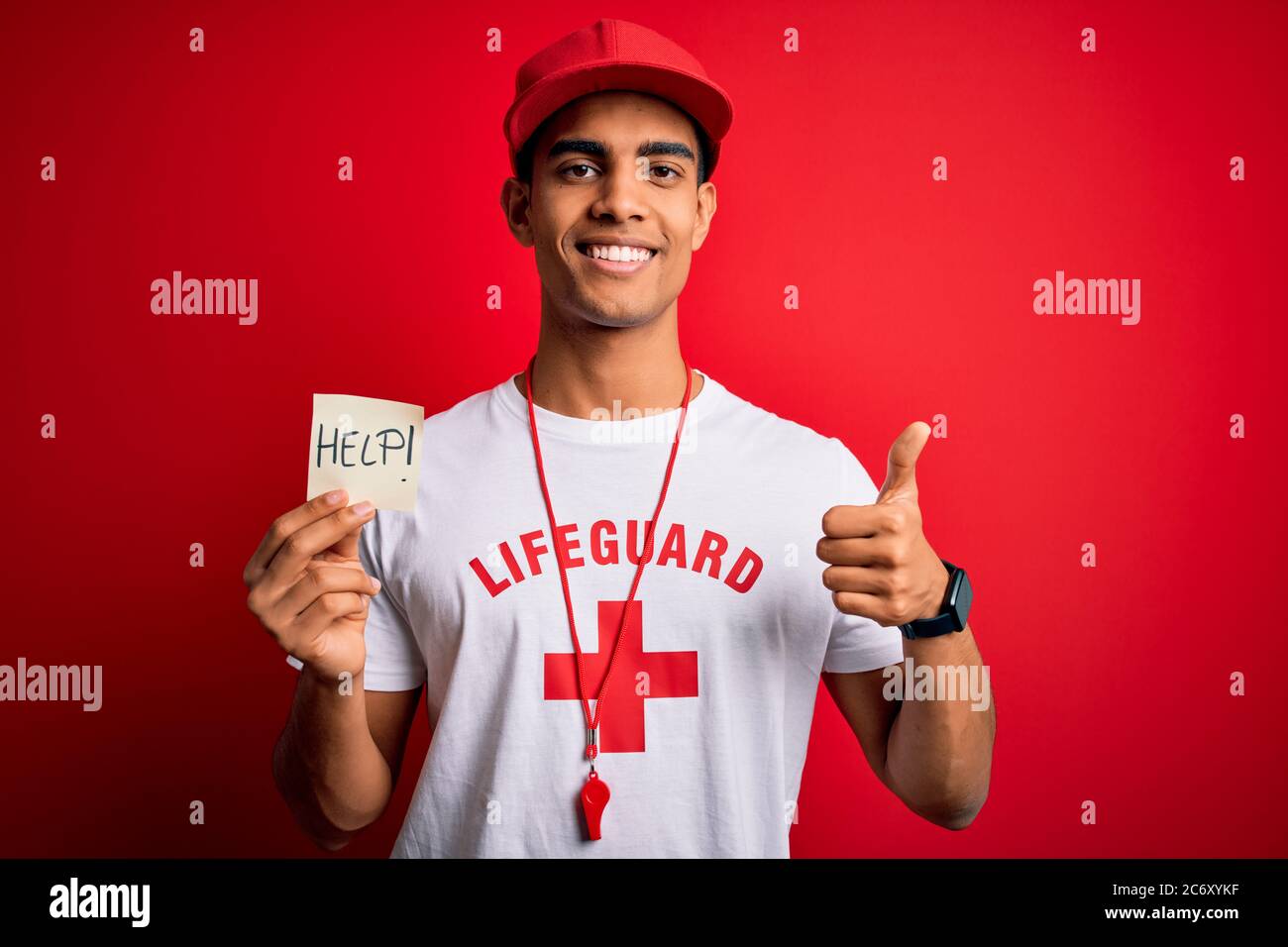 African american lifeguard man holding hi-res stock photography and ...