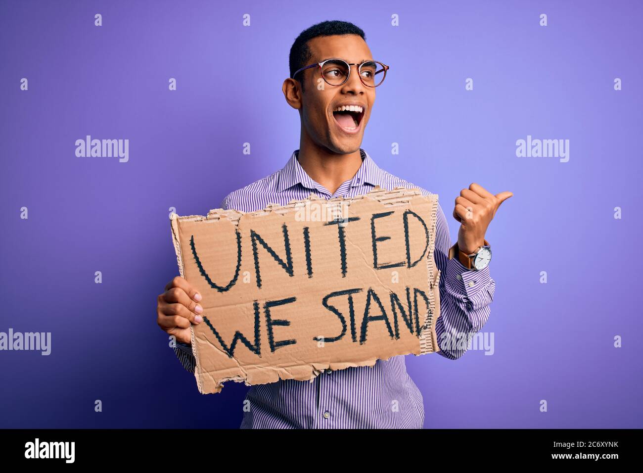 African american activist man asking for union holding banner with ...