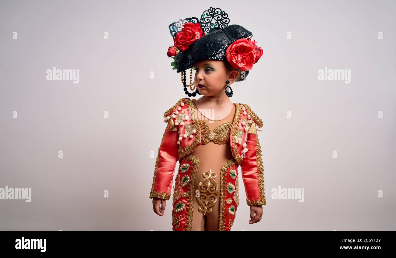 Young little caucasian kid girl wearing bullfighter traditional folkore ...