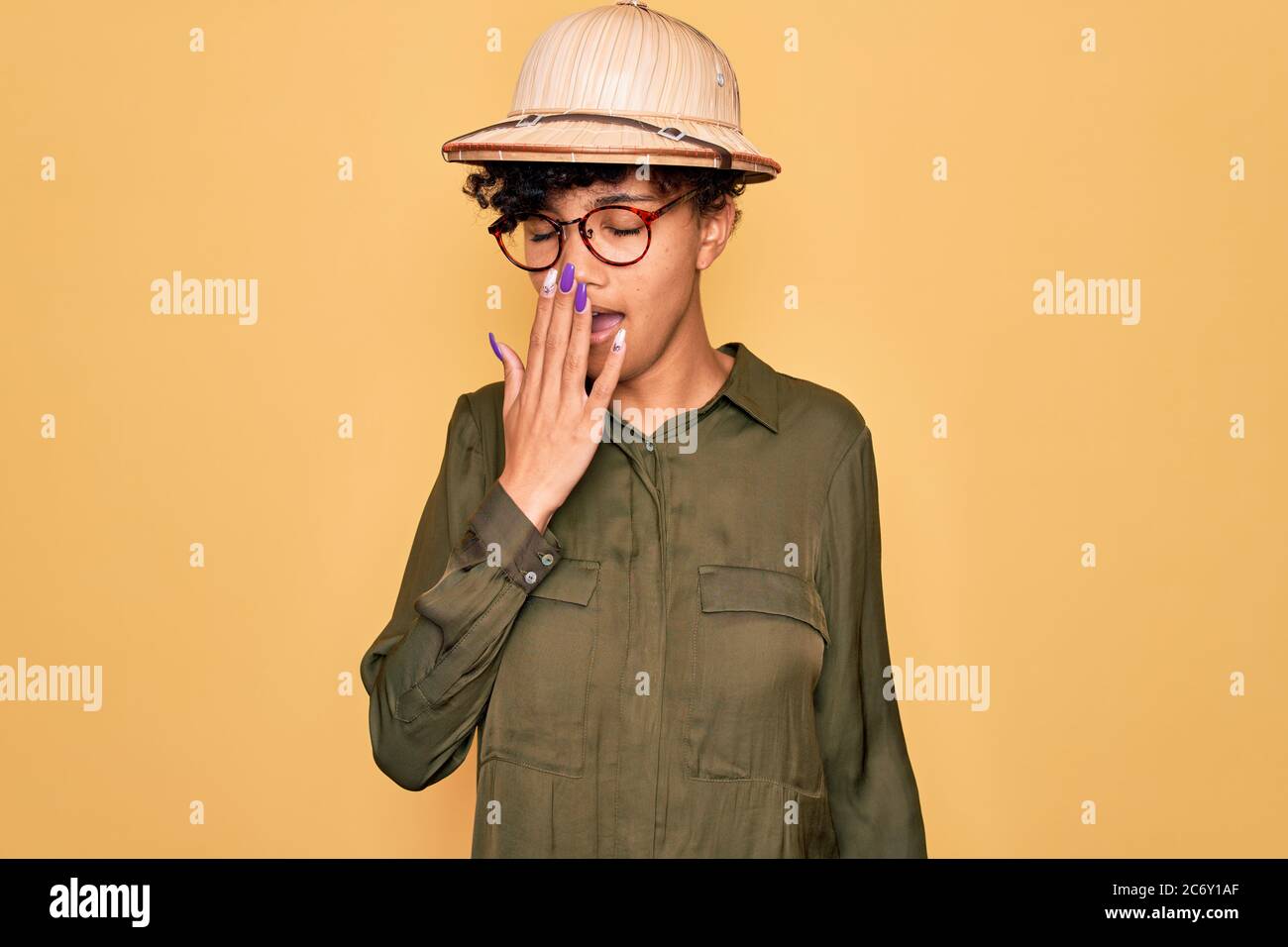 Young beautiful african american tourist woman wearing glasses and ...