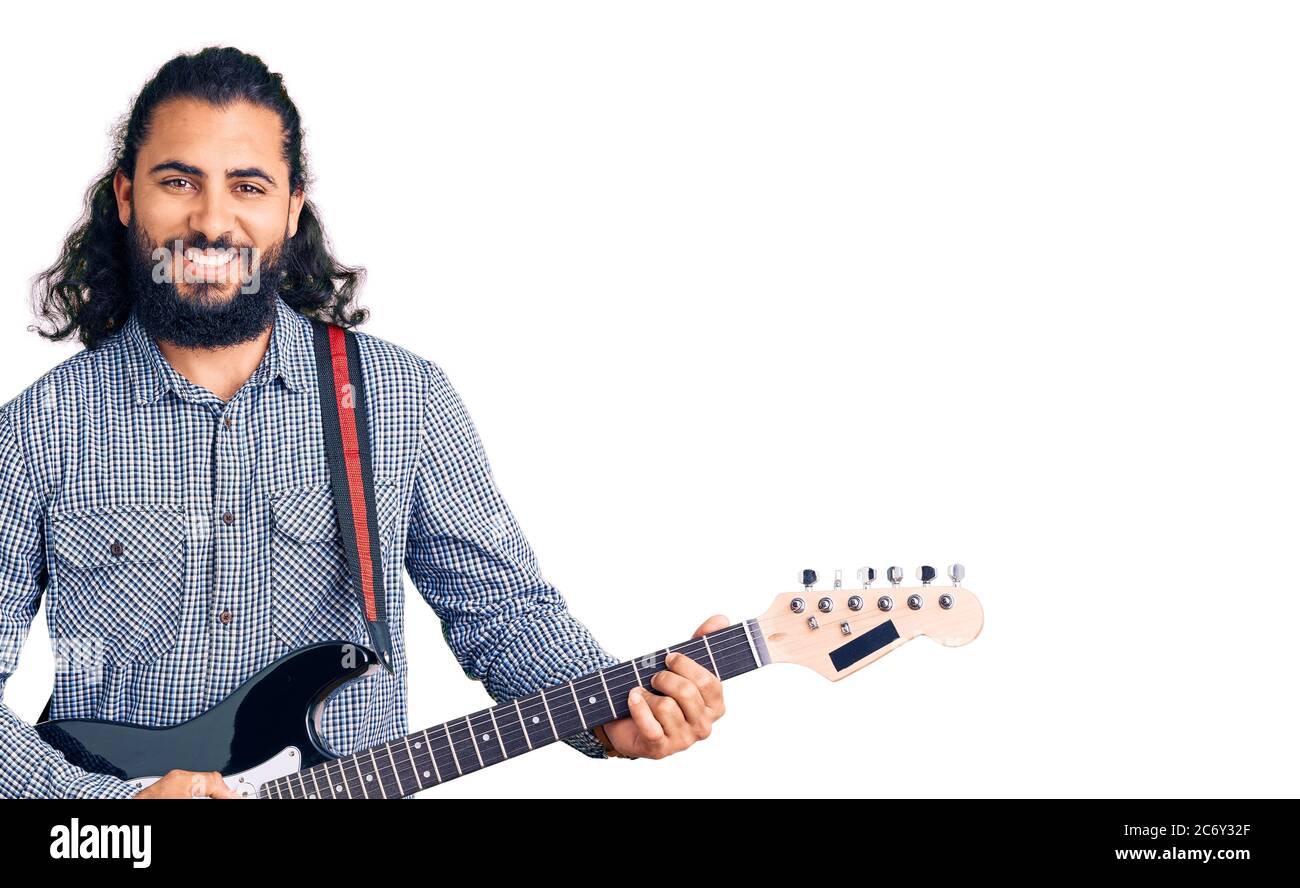 Playing guitar with teeth hi-res stock photography and images - Alamy