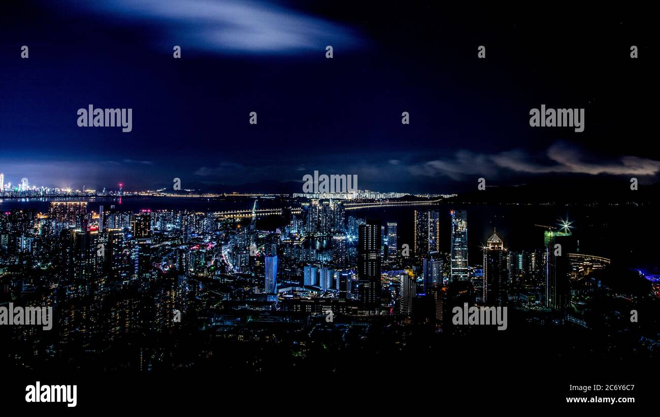 Aerial view of Shenzhen downtown at night in Shenzhen city, south China ...