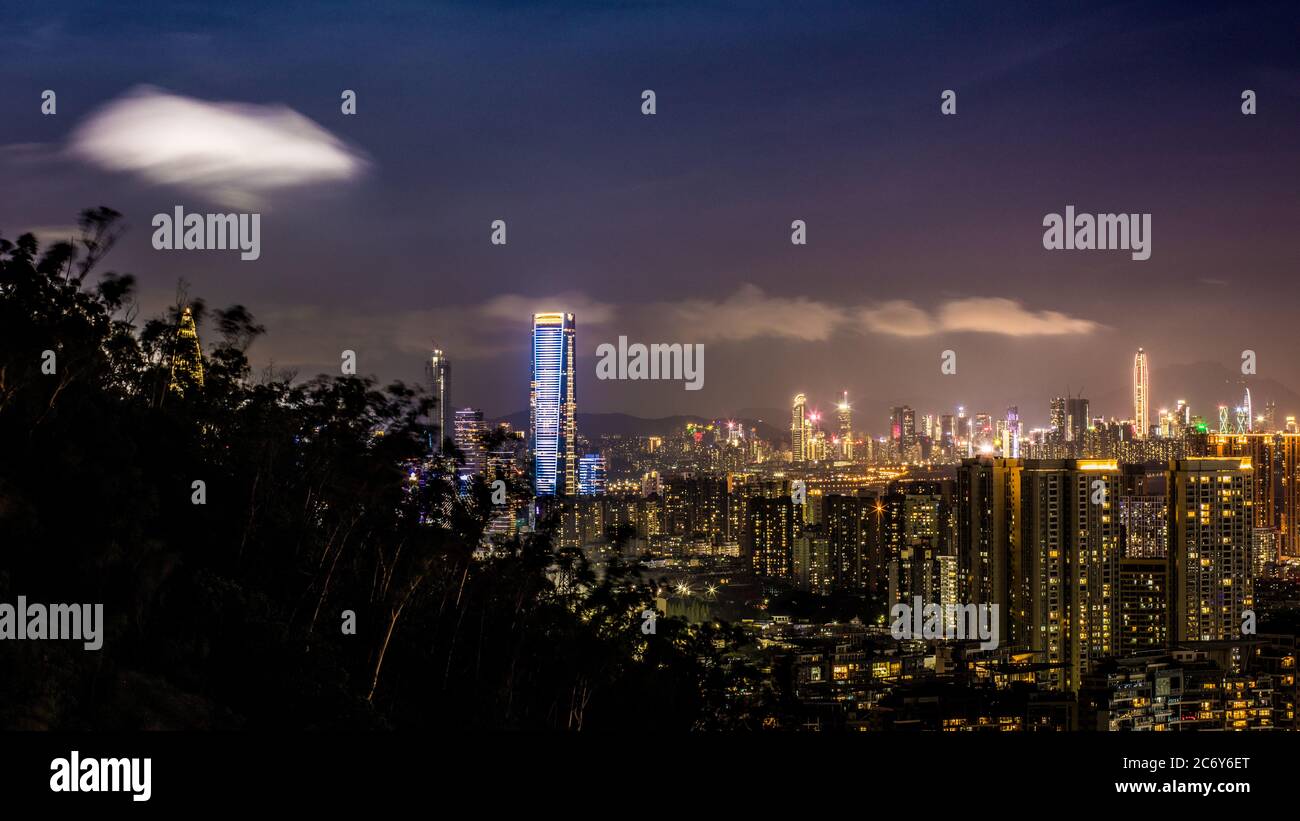 Aerial view of Shenzhen downtown at night in Shenzhen city, south China ...