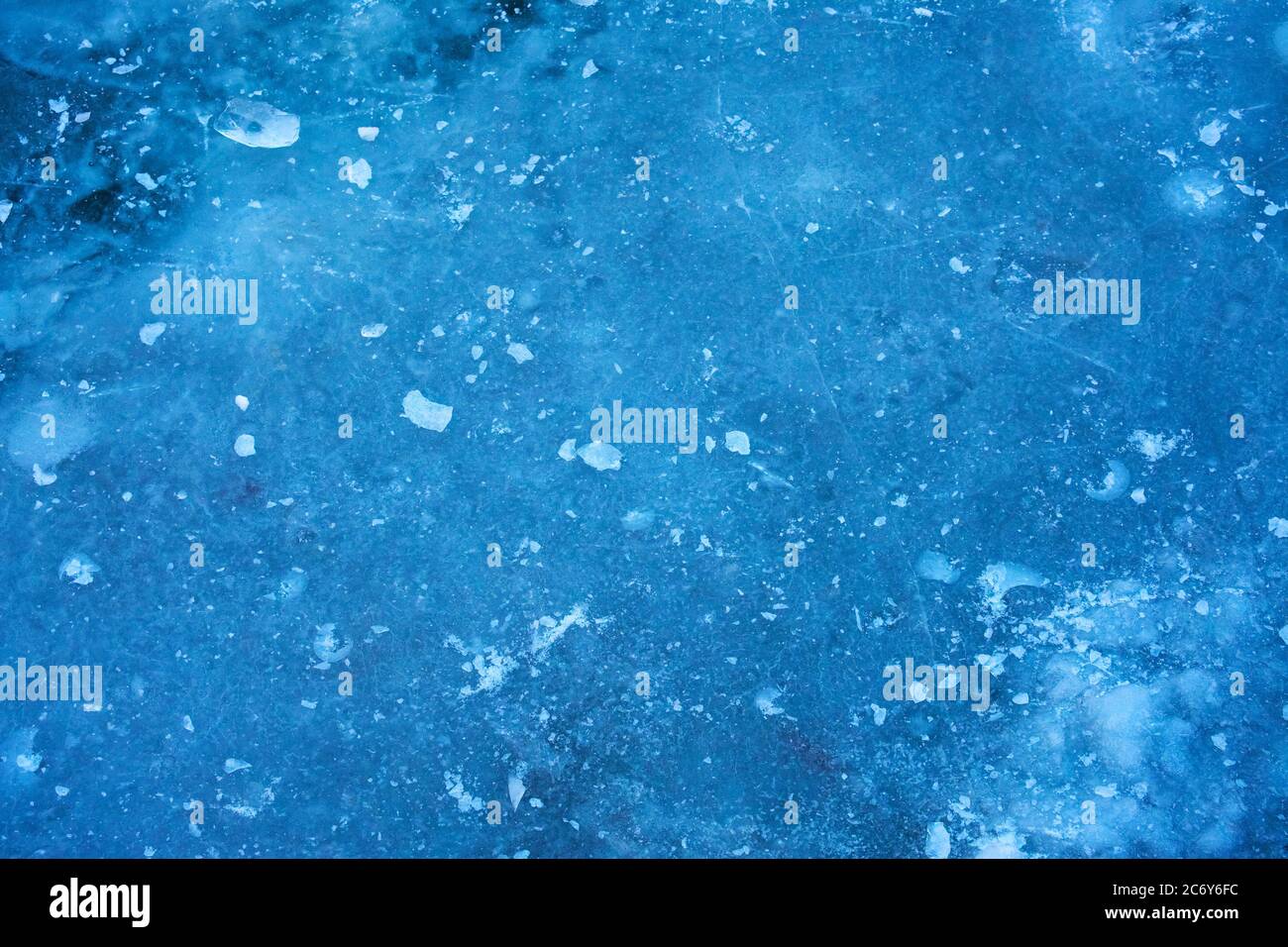 Ice Background on a Lake in Winter with Snow Stock Photo - Alamy
