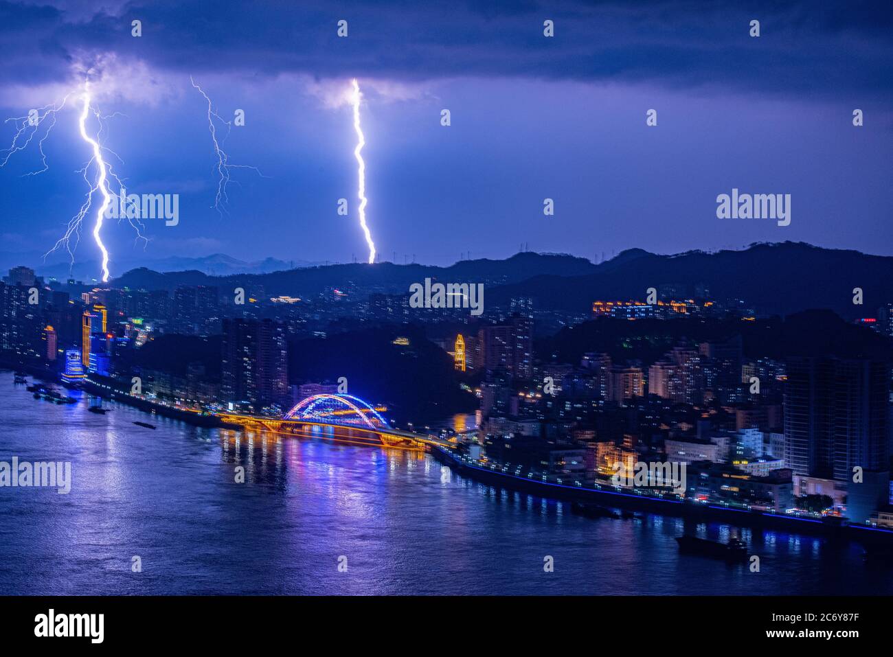 A strike of lightening is captured in Wuzhou city, south China's ...