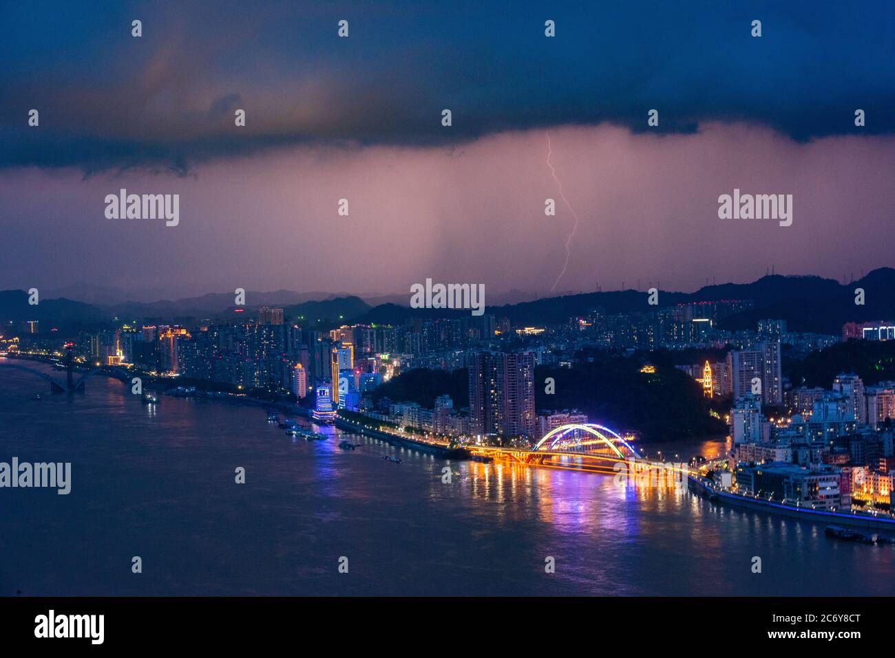 A strike of lightening is captured in Wuzhou city, south China's ...