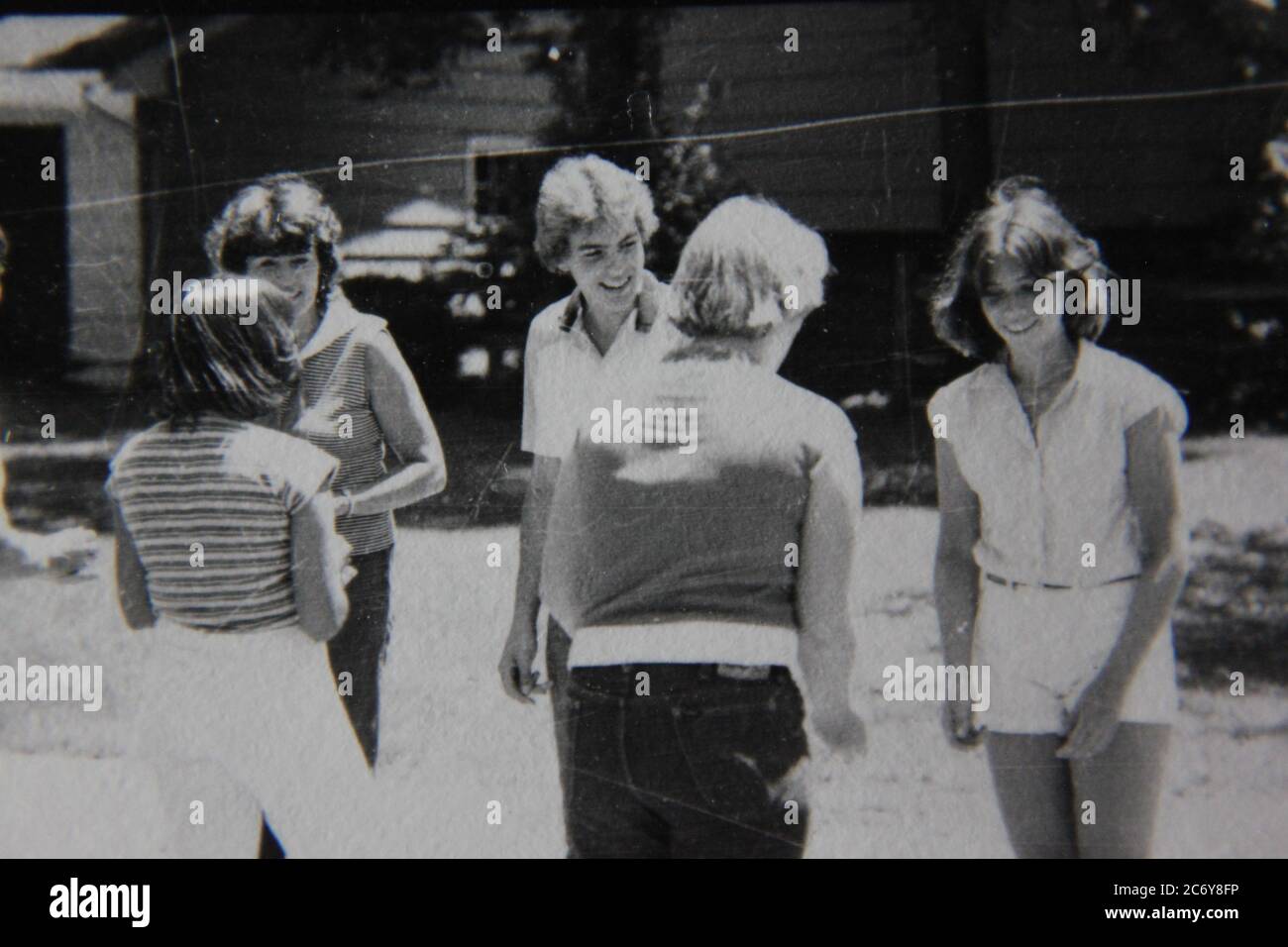 Fine 70s vintage black and white lifestyle photography of a friendly ...