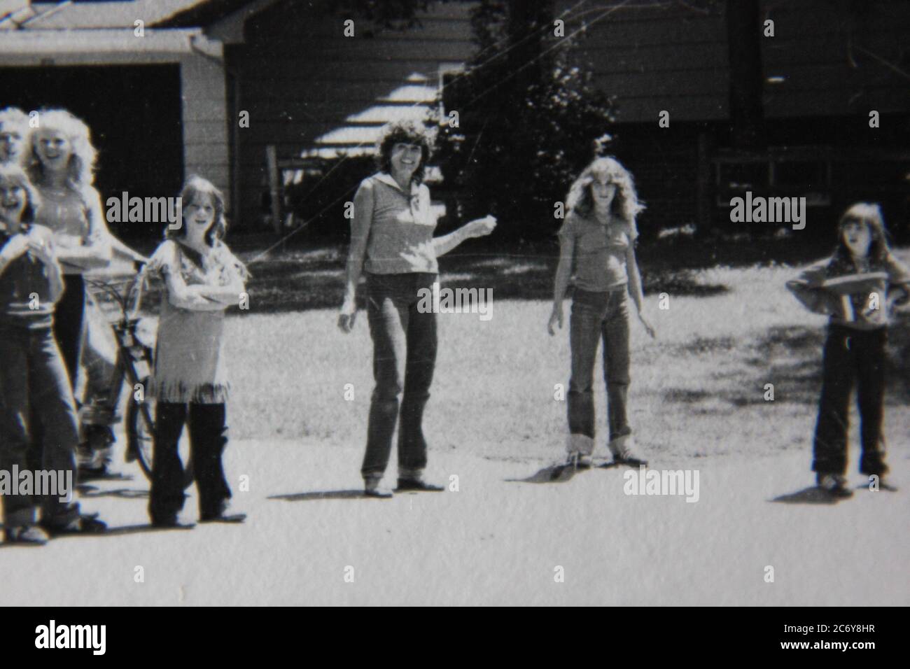 Fine 70s vintage black and white lifestyle photography of a friendly ...