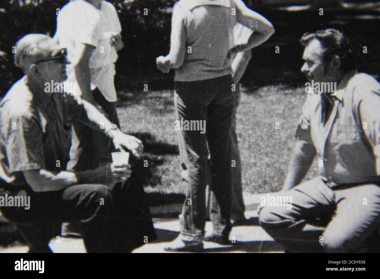 Fine 70s vintage black and white lifestyle photography of a friendly ...
